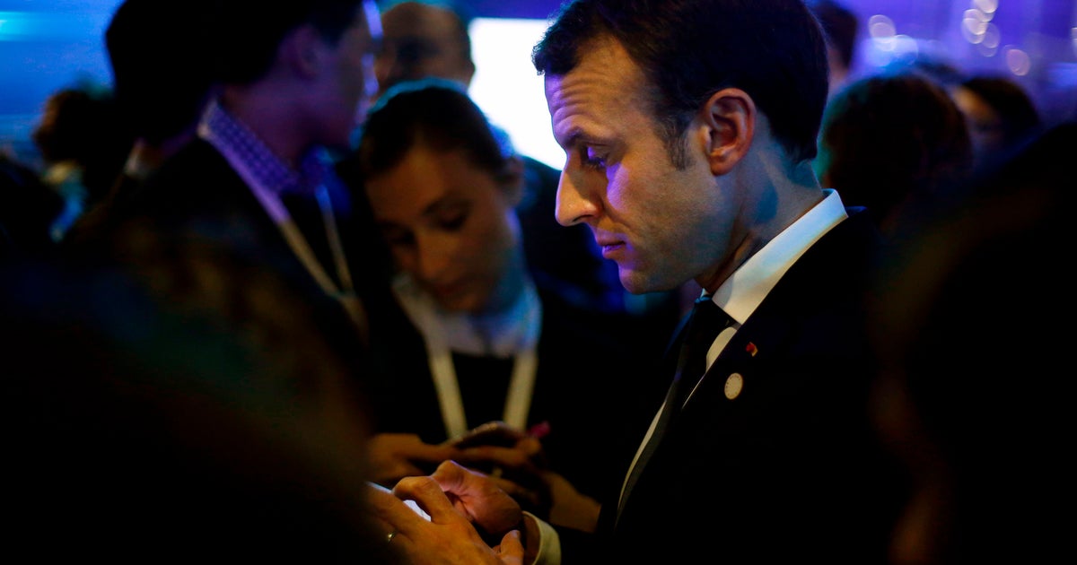 French President Emmanuel Macron changes phone after reports of wide ...