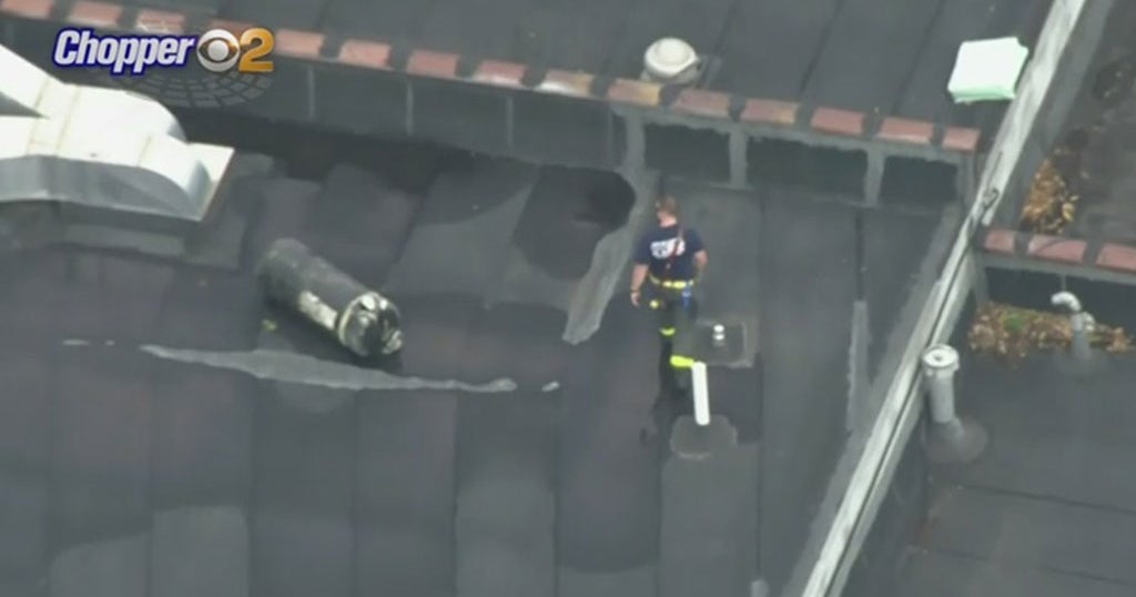 Propane Tank Explodes, Launches Onto Roof Of Neighboring Building In ...