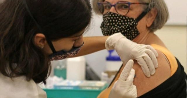 COVID-19 vaccine booster shot side effects similar to first two doses ...