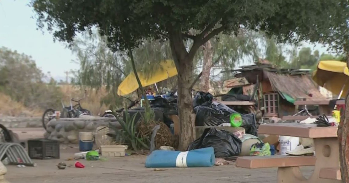 Homeless Encampment Cleanup Underway In Azusa Riverbed - CBS Los Angeles