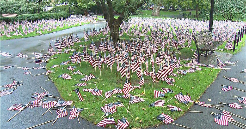 American flag display honoring 9/11 victims vandalized in Boston - CBS News