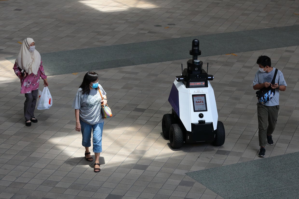 Singapore trials patrol robots to warn people of "undesirable" behavior ...