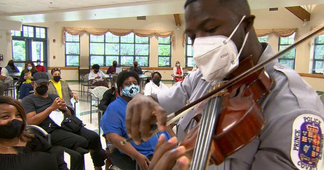 Violin-playing police officer finds ways to serve the public with both ...