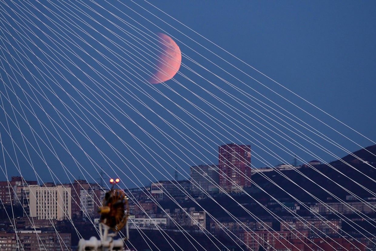 Stunning images of longest partial lunar eclipse since 1440