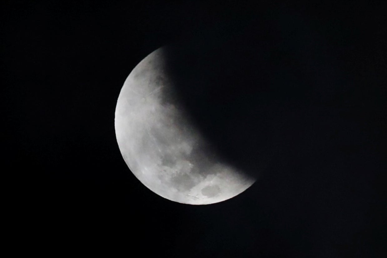 Stunning images of longest partial lunar eclipse since 1440
