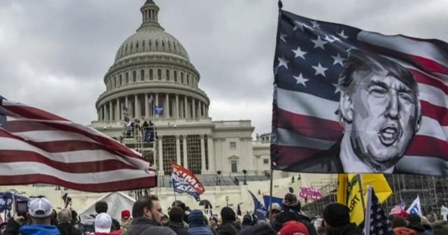 Washington marks one year since deadly attack on U.S. Capitol - CBS News