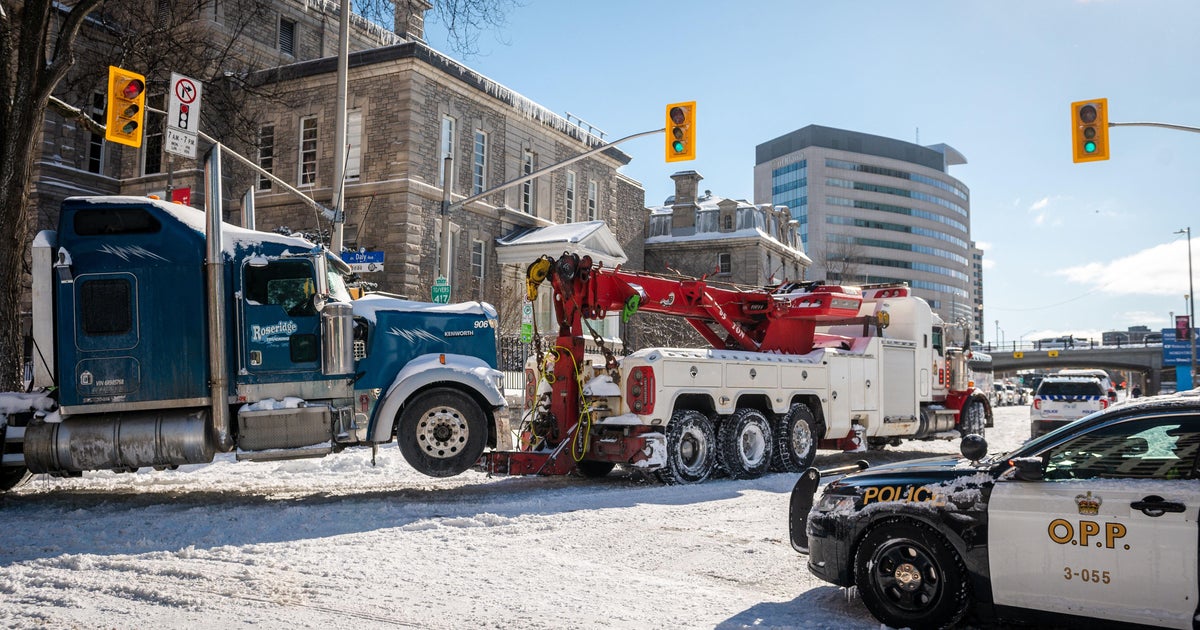 At least 100 arrested in police crackdown on Ottawa protest - CBS News
