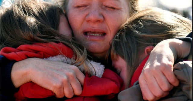 Photos and videos depict a month of horror in Ukraine - CBS News