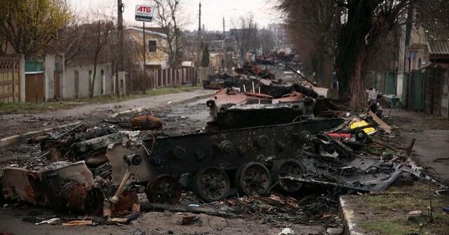 Another town near Kyiv destroyed as cleanup crews search through rubble ...
