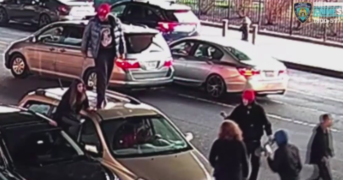 Caught on video: Carjacking suspects jump on top of van, start ...
