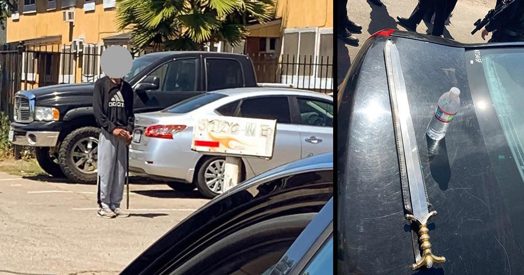 'Distressed' man wielding sword surrenders after 4-hour standoff in ...