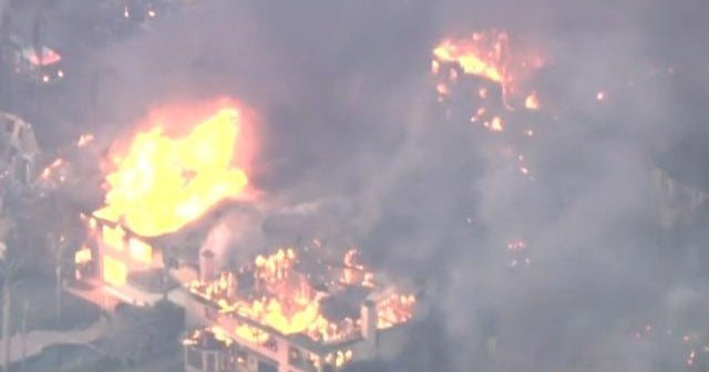 Coastal Fire destroys homes in Orange County, California - CBS News