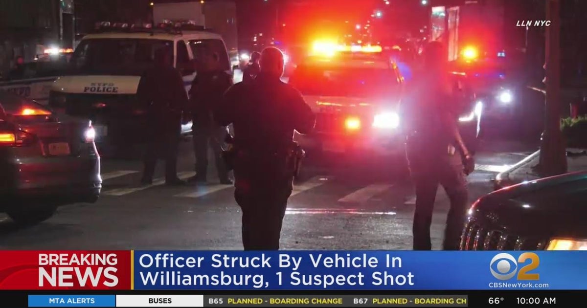 NYPD officers open fire on SUV driver after officer struck - CBS New York NYPD officers open fire on SUV driver after officer struck - CBS New York