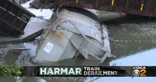 Derailed train leaked 3,000 gallons of petroleum distillate into water ...