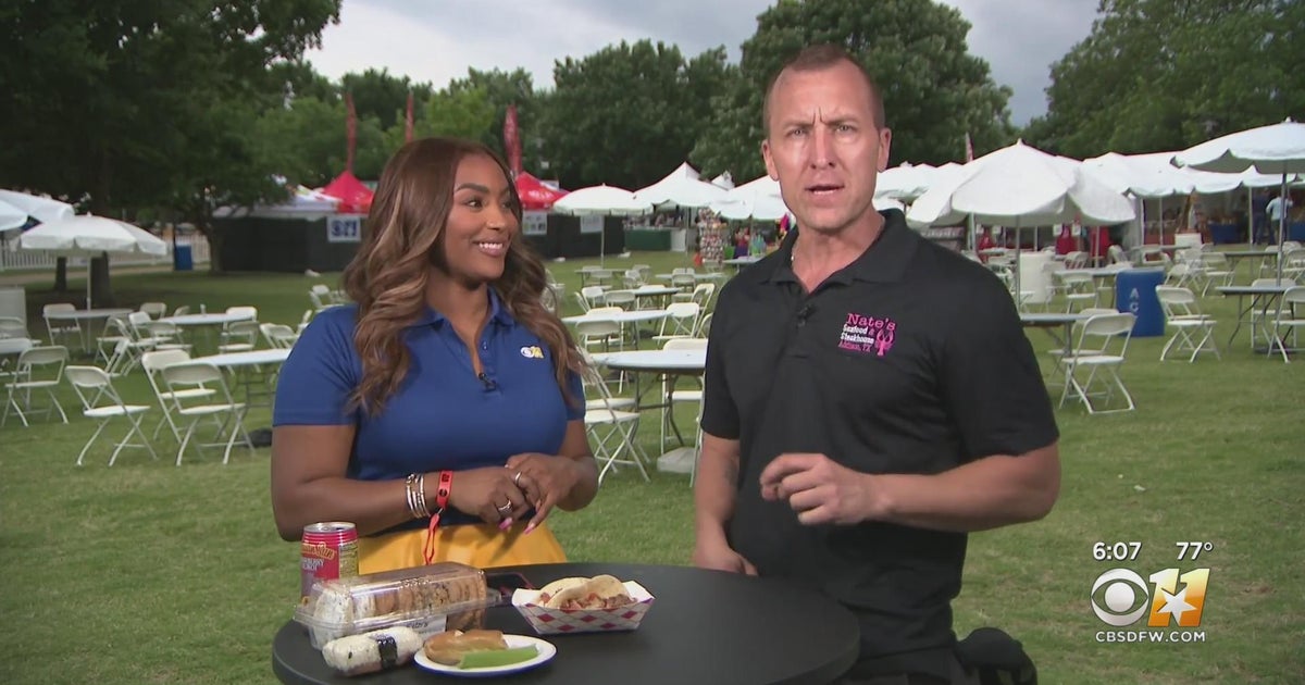 Nicole Baker talks to vendors at Taste Addison - CBS Texas