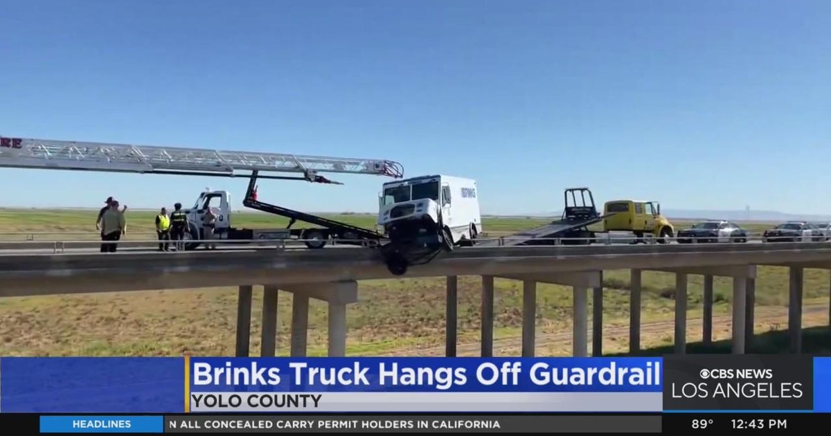 Brinks truck nearly goes off side of highway in Northern California ...