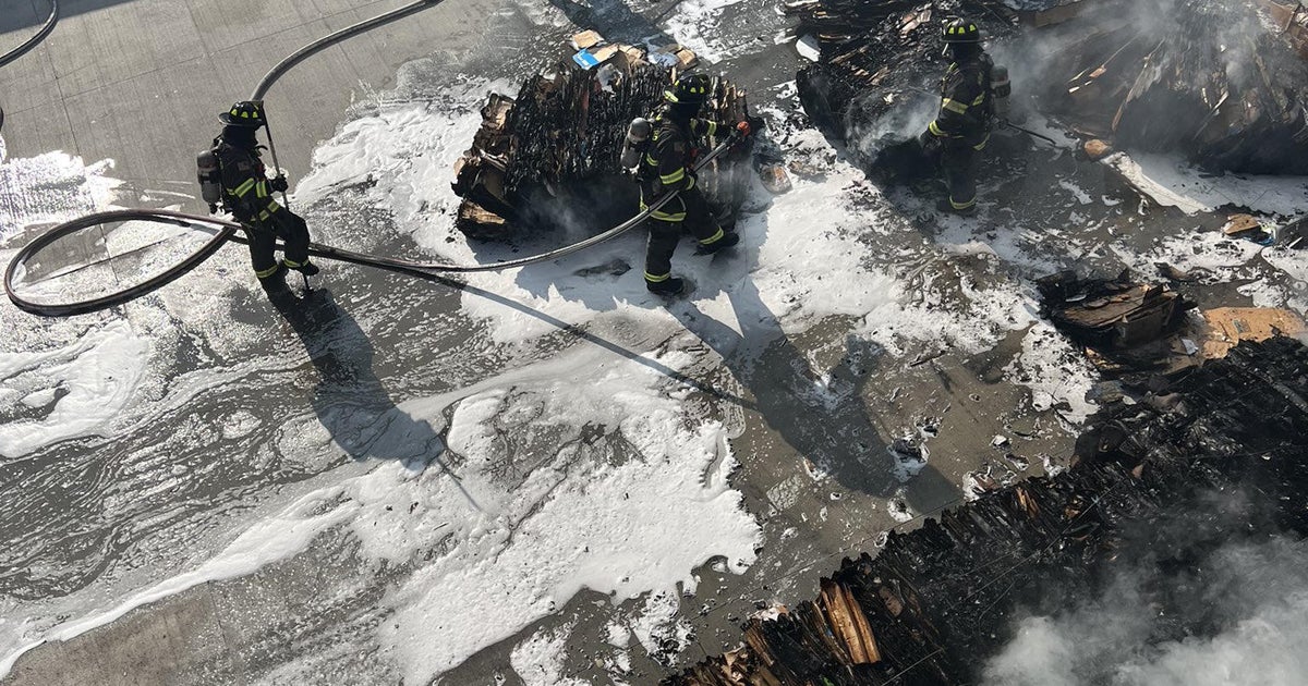Suspect in custody in connection with pallet fire at Walmart - CBS Colorado