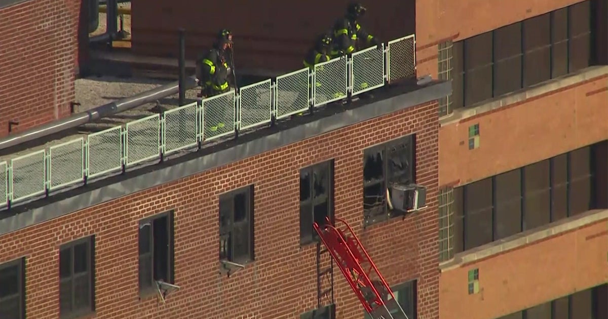 Firefighters battle high-rise fire in Edgemere, Queens - CBS New York