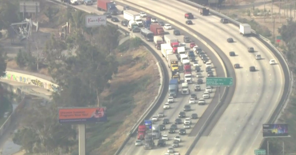 Convoy of big rigs slow traffic on LA freeways in protest of gig worker ...