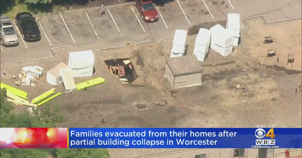 Families evacuated from apartment building after roof collapse - CBS Boston