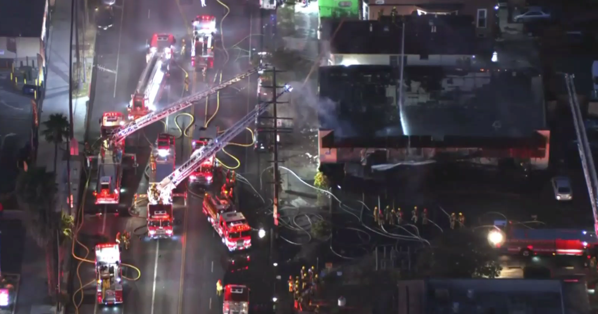 Three firefighters injured while battling large fire at commercial ...
