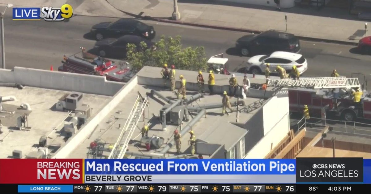Man rescued from ventilation pipe - CBS Los Angeles