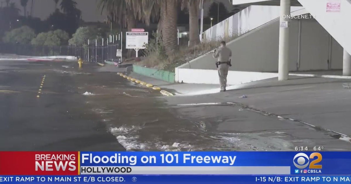 Water main break floods 101 Freeway through Hollywood - CBS Los Angeles