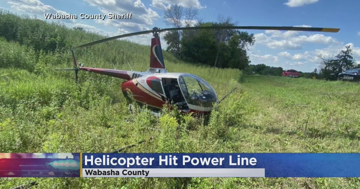 Pilot uninjured after helicopter hits power line in Wabasha County ...
