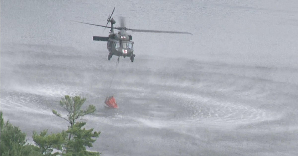 Watch: Helicopter drops water on Breakheart Reservation fire in Saugus ...