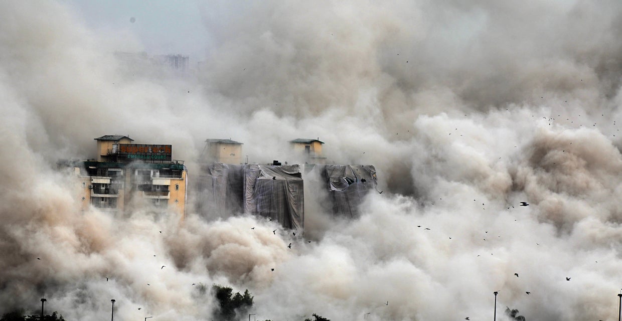 Two high-rise towers no one ever lived in get imploded after 12-year ...