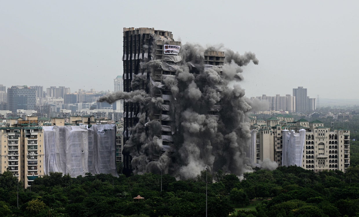 Two high-rise towers no one ever lived in get imploded after 12-year ...