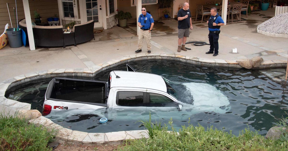 Pickup truck crashes into Menifee backyard, ends up in pool - CBS Los ...