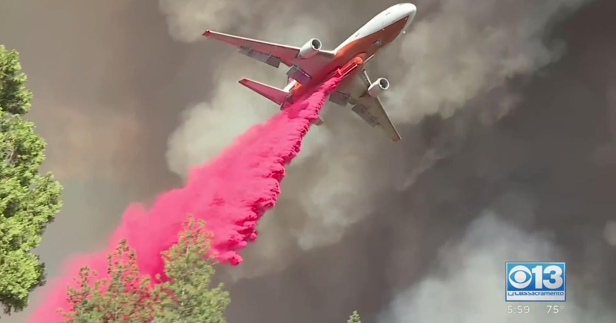 California Wildfires: Mosquito Fire — Road blanketed with fire ...