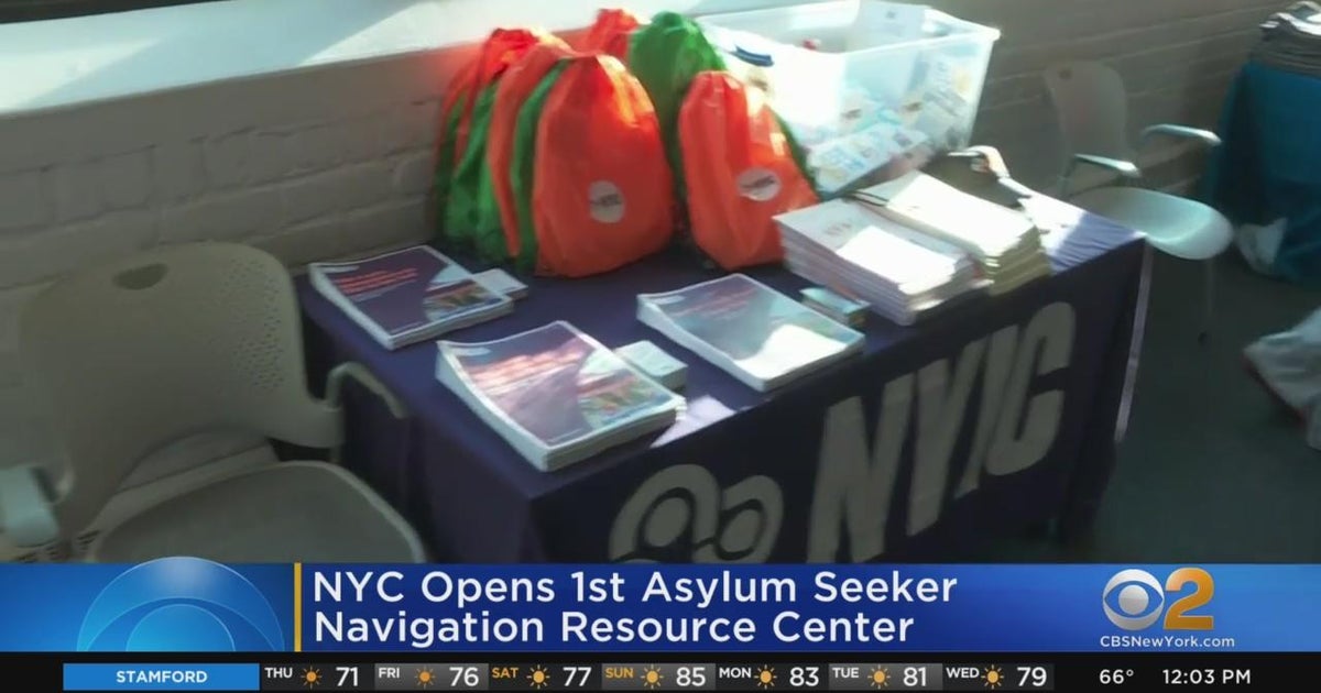 NYC opens resource center for asylum seekers - CBS New York