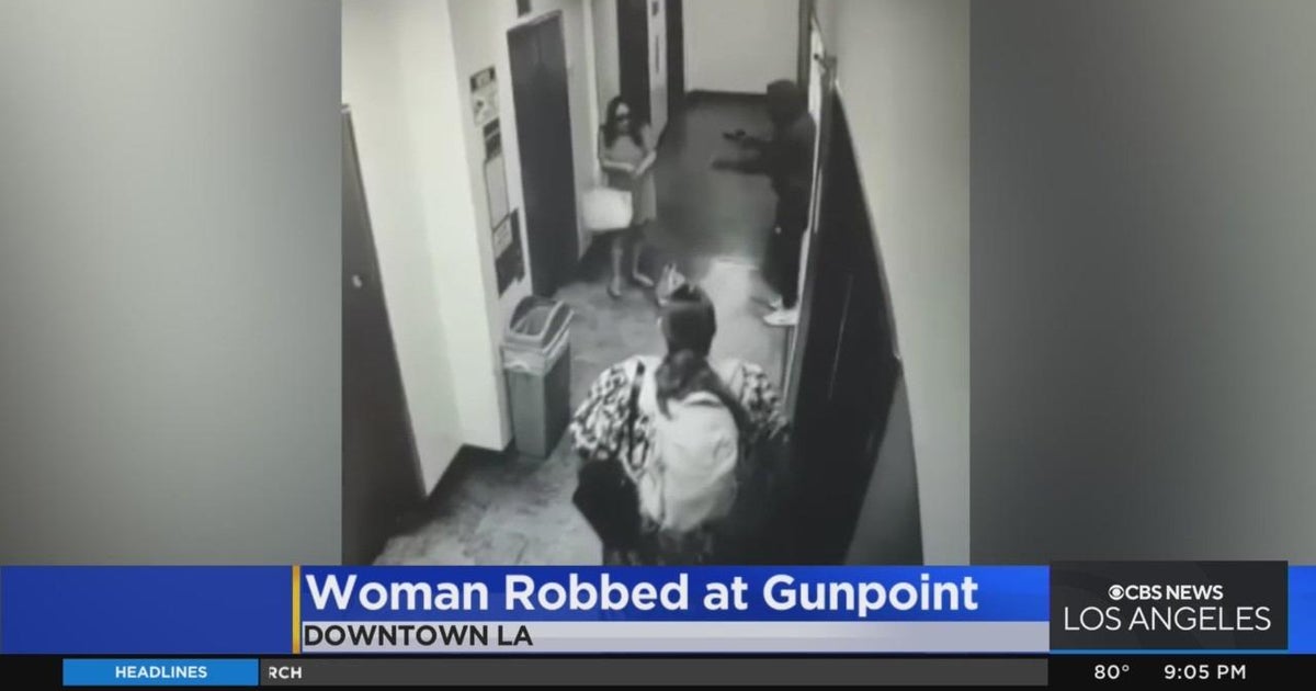 Investigation underway after video shows woman robbed at gunpoint ...