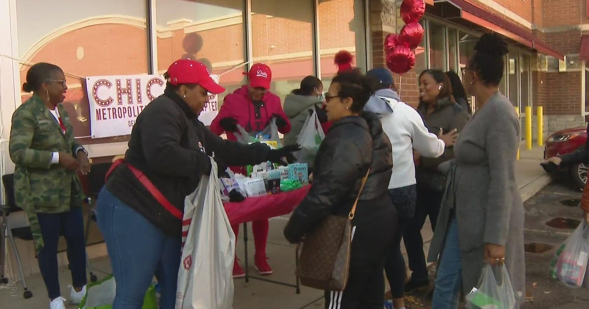 Volunteers take donations for survivors of domestic violence - CBS Chicago