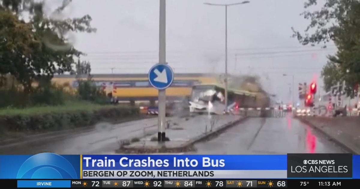 Caught on Camera: Train slams into bus stopped on tracks in Netherlands ...