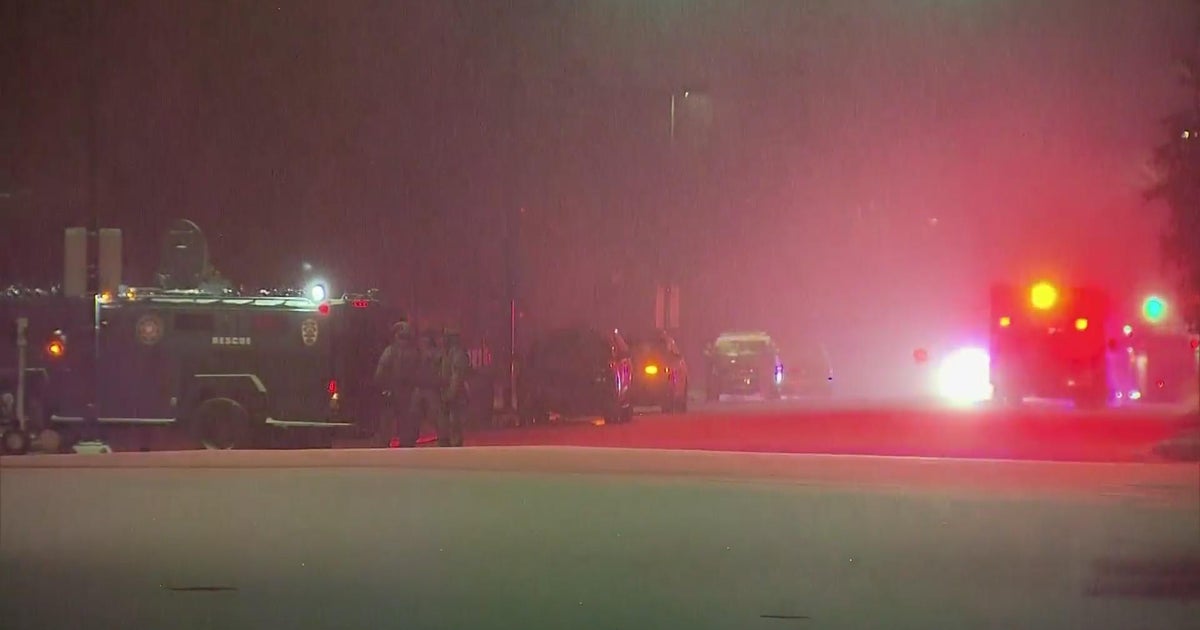 Armed suspect in custody after 2 hostages rescued from Boulder home ...