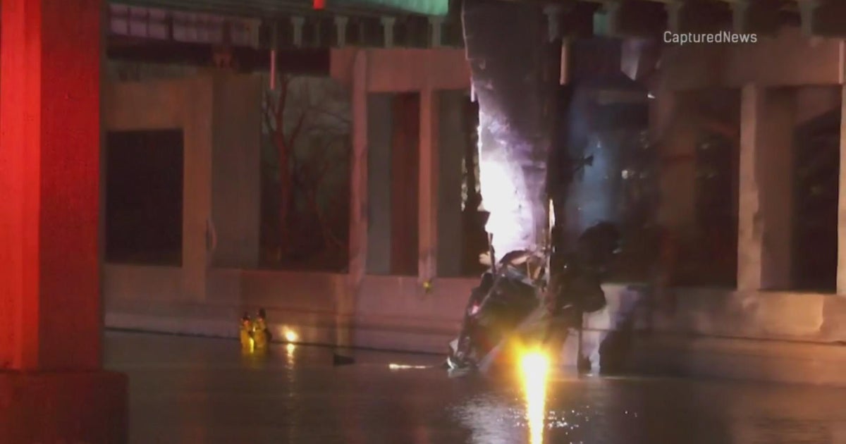 Driver released from hospital after semi truck goes off bridge, catches ...