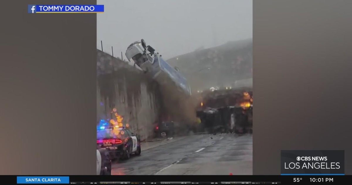 Driver details wild moments as he captured video of truck falling over ...