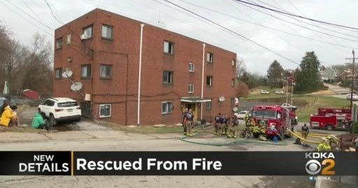 Fire at apartment building forces residents to jump from windows to ...