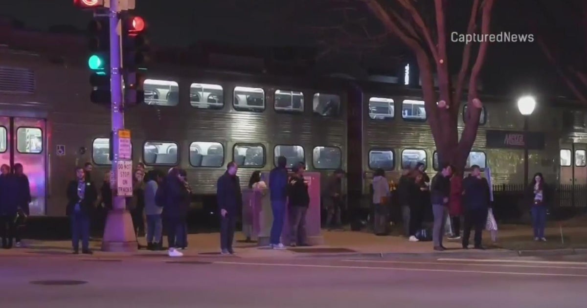 Person hurt after Metra train hits car in Arlington Heights - CBS Chicago