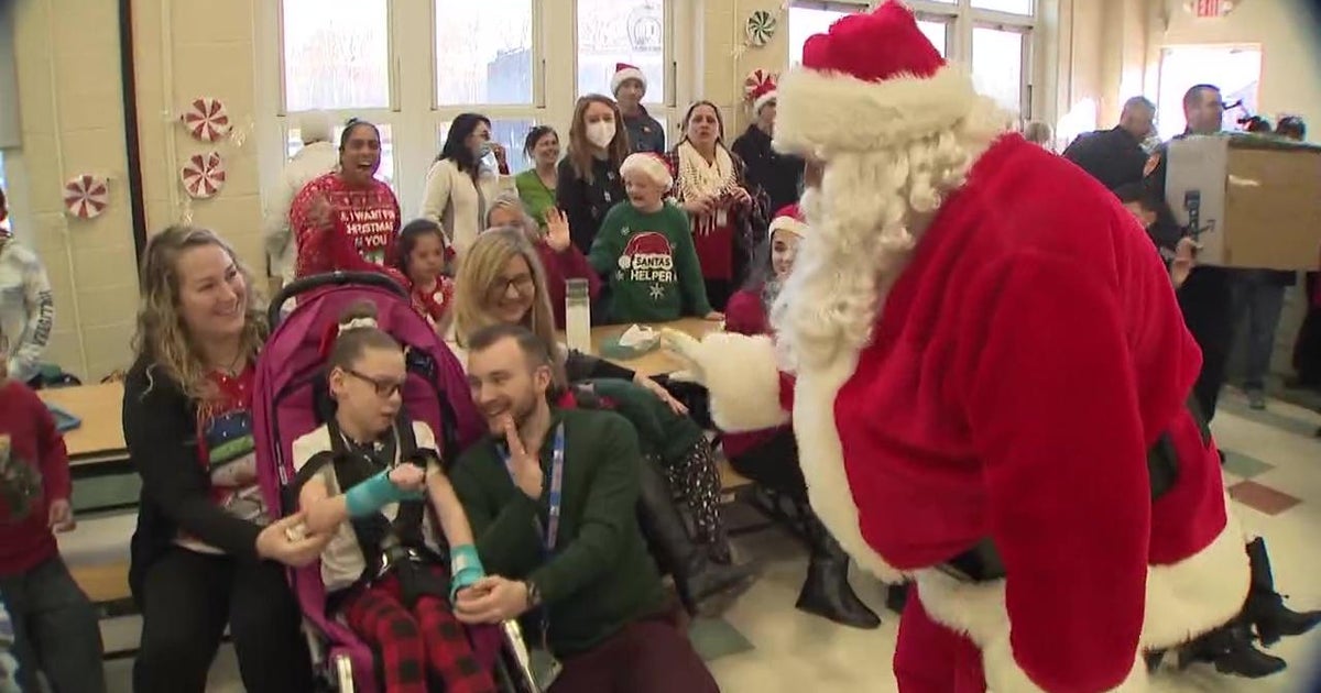Santa delivers toys to special needs students at the Premm Learning ...