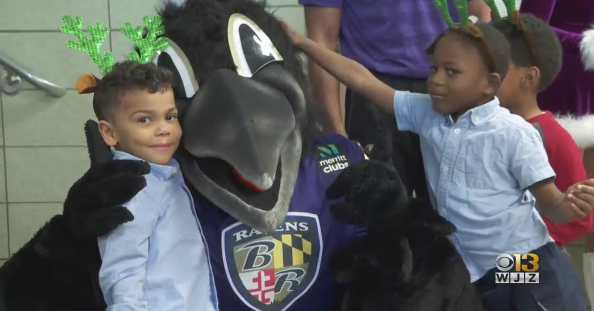 Ravens, partners host food distribution for families at elementary ...