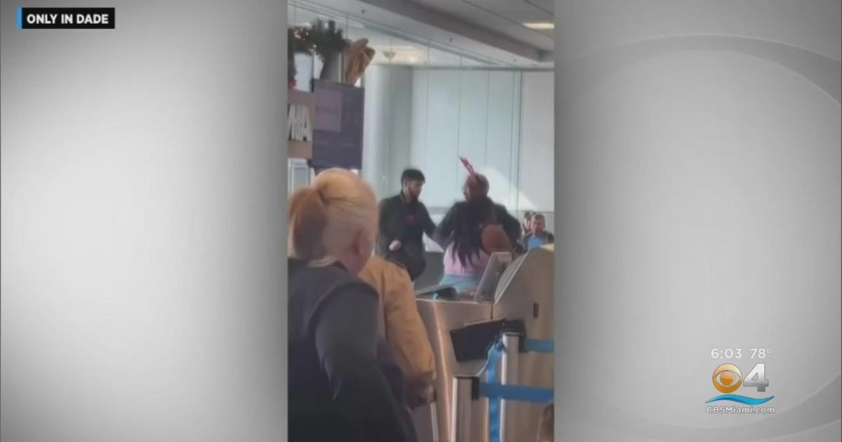 Woman caught on video throwing monitor at ticket counter employee at ...