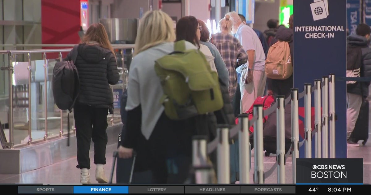 Logan Airport packed as storm expected to impact holiday travel - CBS ...