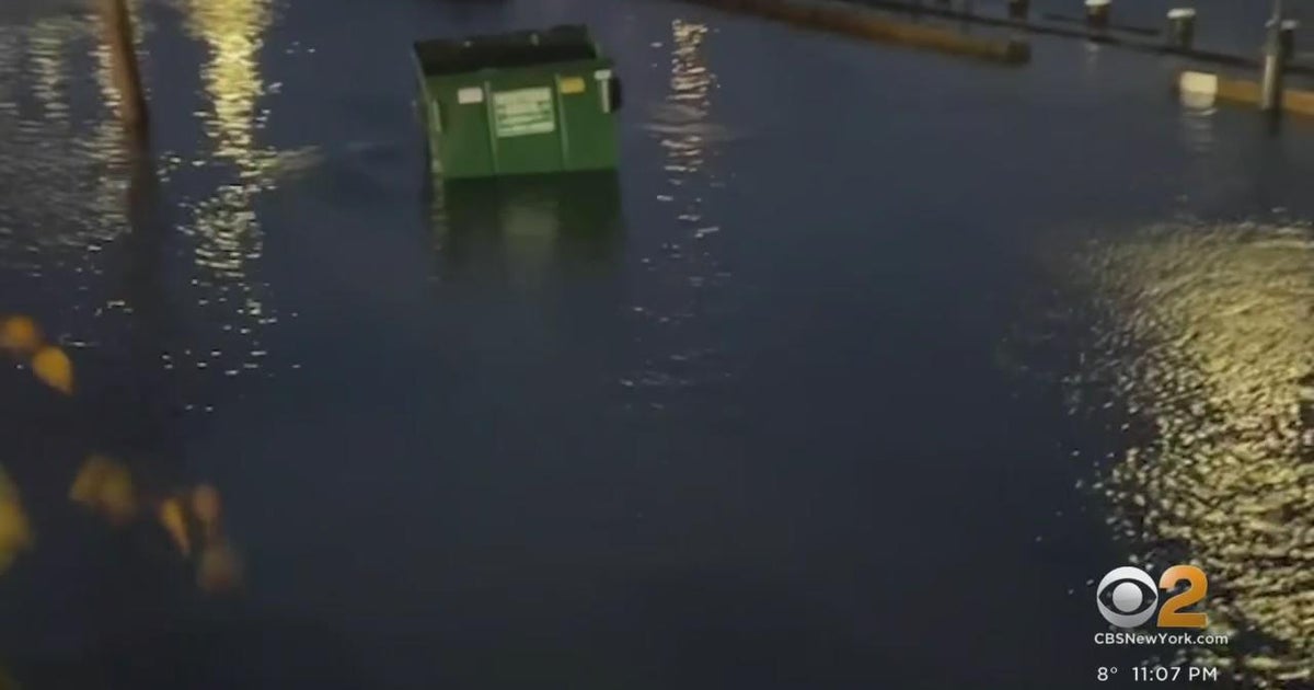 Flooding swallows up cars on Long Island - CBS New York