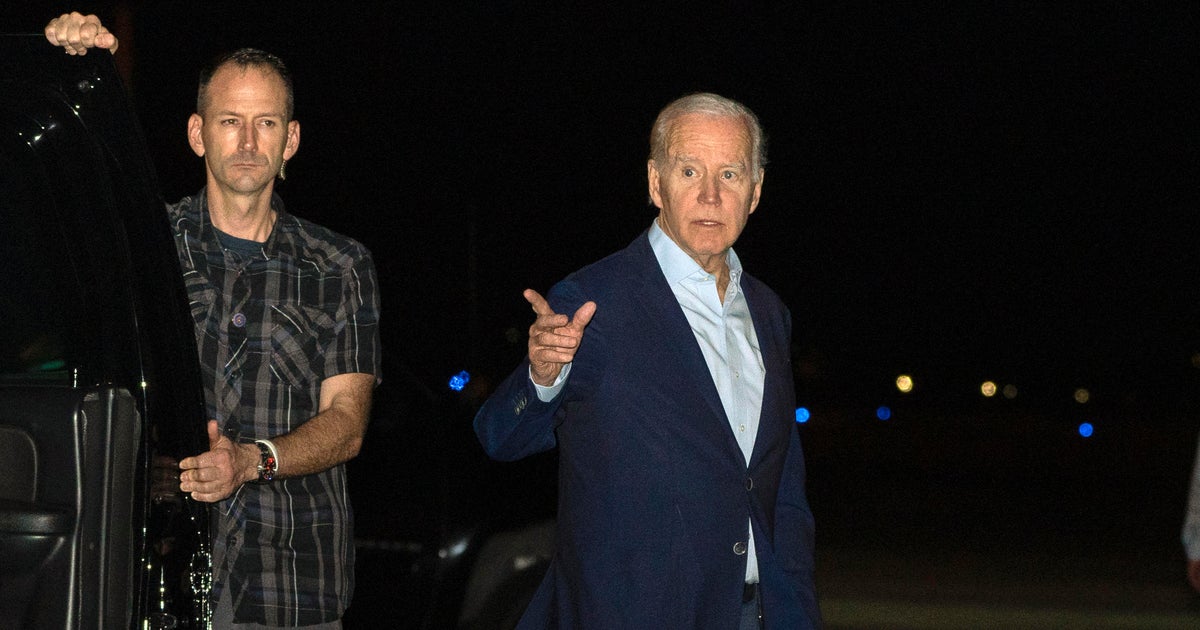 Biden signs $1.7 trillion government spending bill - CBS News