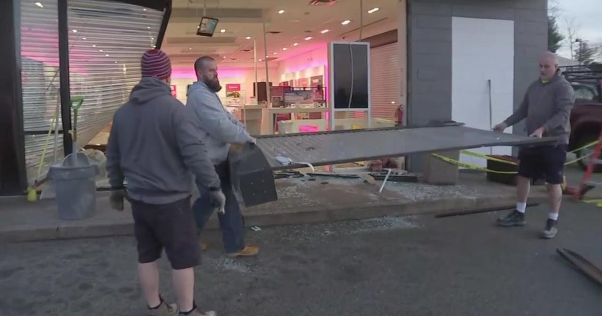 Crews working at T-Mobile store where car crashed - CBS Philadelphia