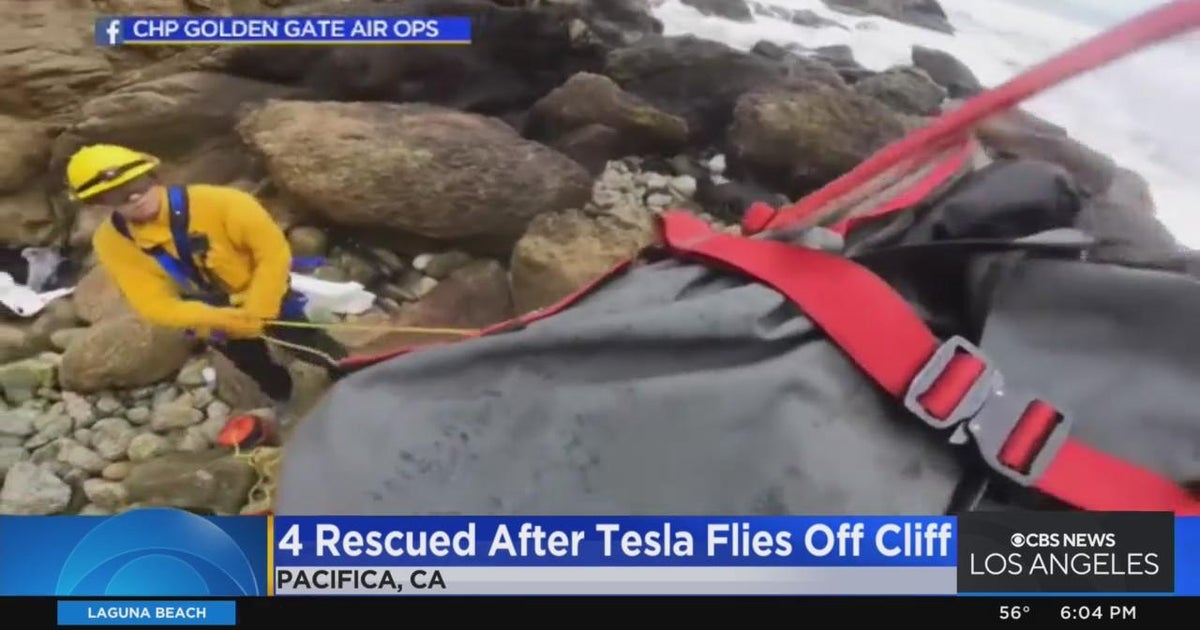 4 rescued after Tesla flies off cliff in Pacifica - CBS Los Angeles